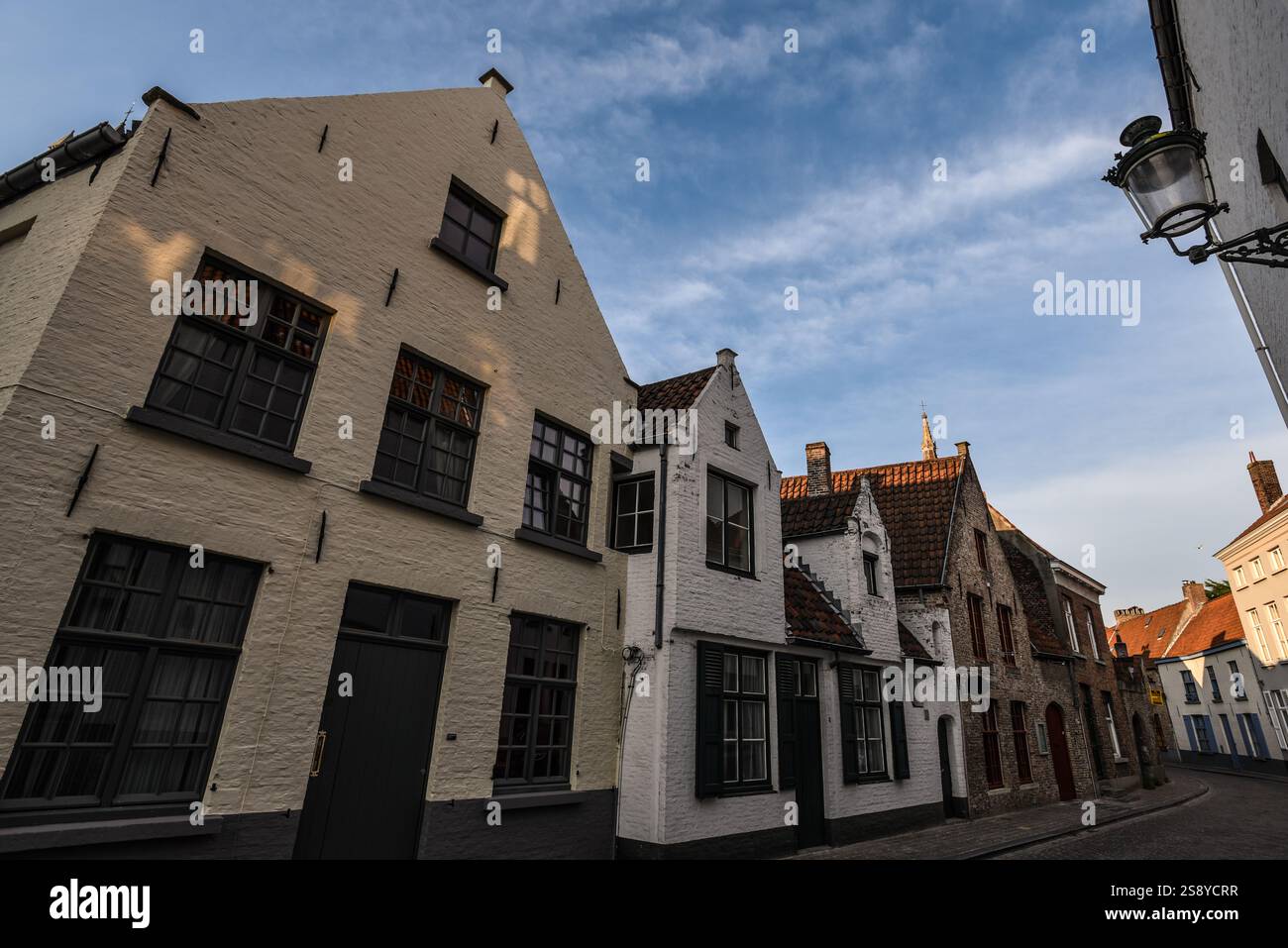 Quaint Flemish-Style Homes at Dusk in Bruges, Belgium Stock Photo - Alamy