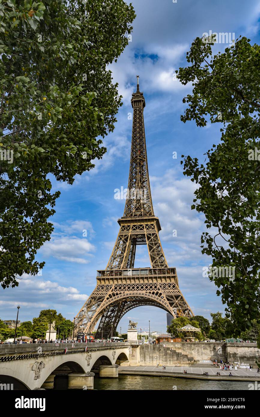 The Eiffel Tower and Pont d'Iéna framed by Greenery over the Seine ...