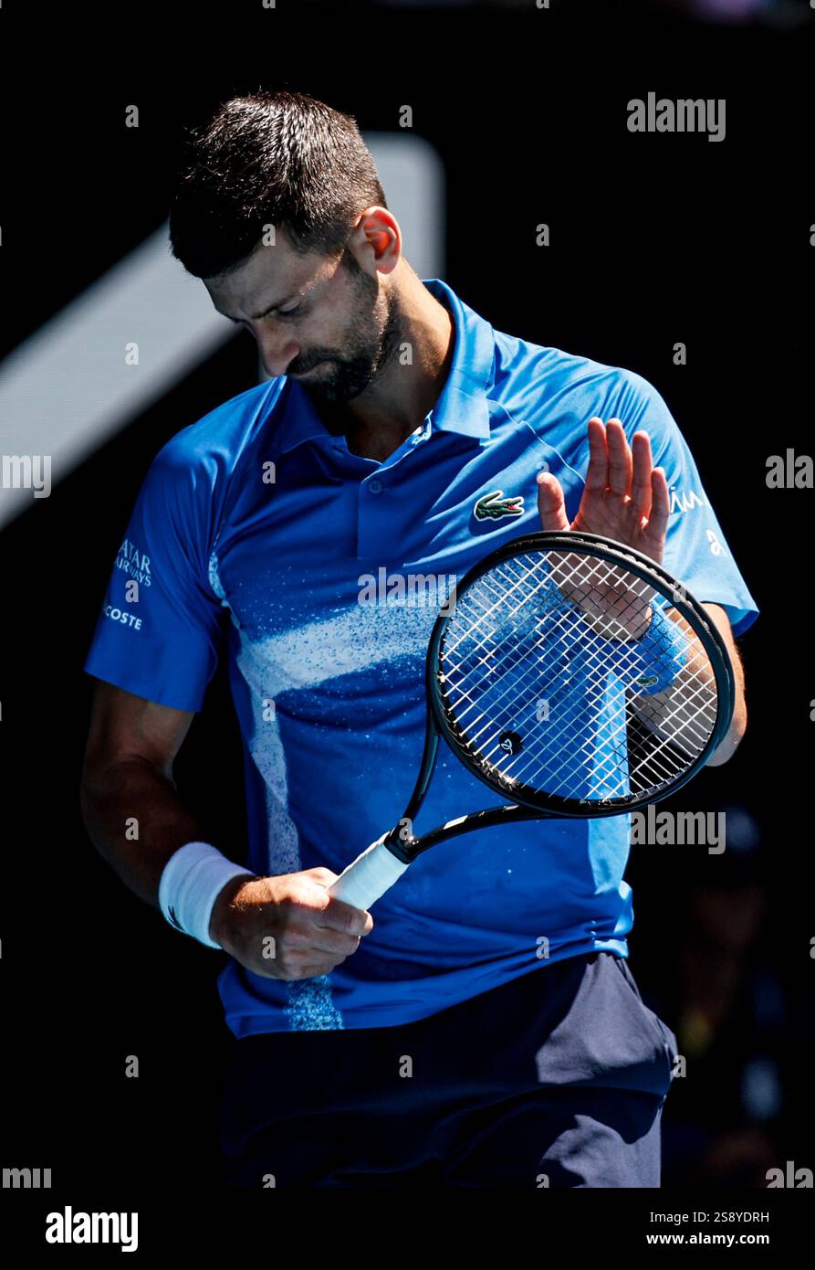 (250124) -- MELBOURNE, Jan. 24, 2025 (Xinhua) -- Novak Djokovic reacts during the men's singles ...