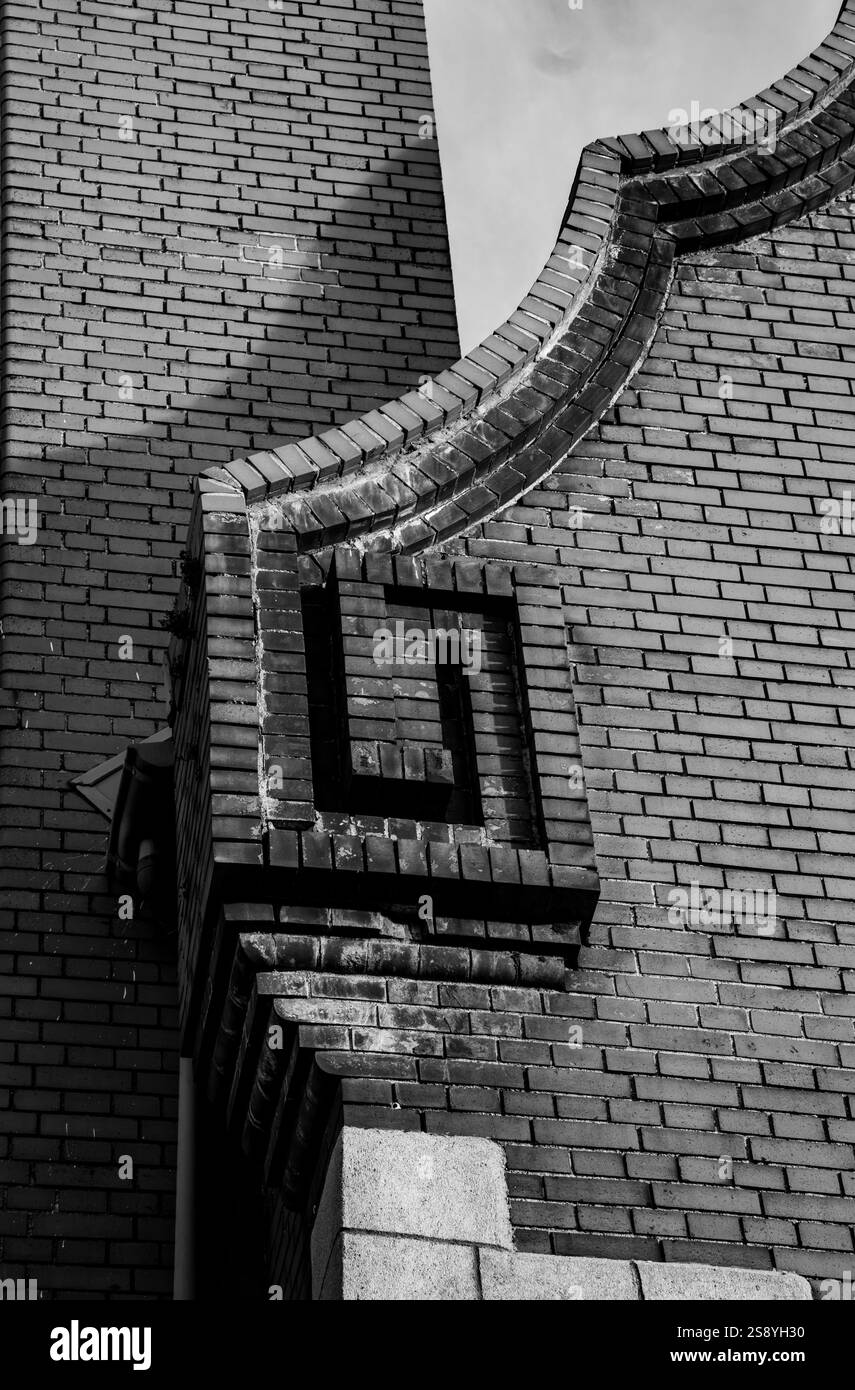 Architectural detail of a brick building showcasing unique design ...
