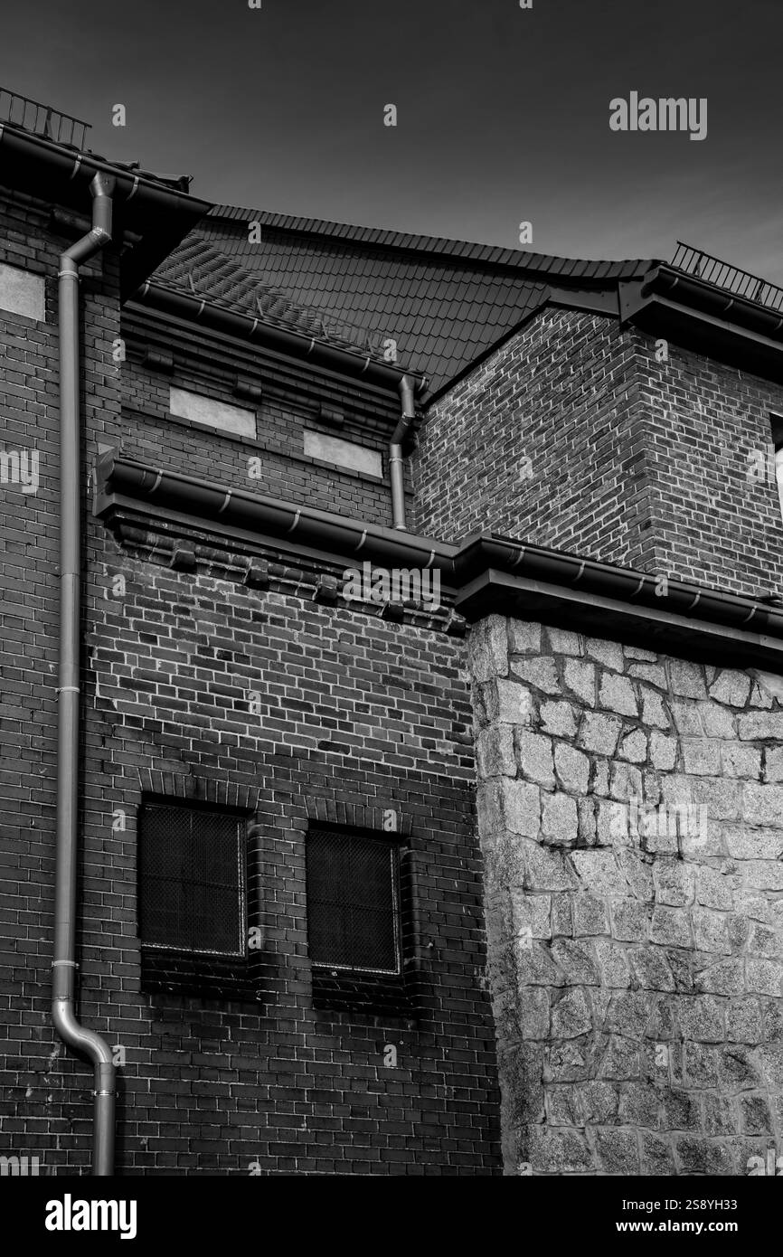 Historic brick building with distinctive architecture in urban setting ...