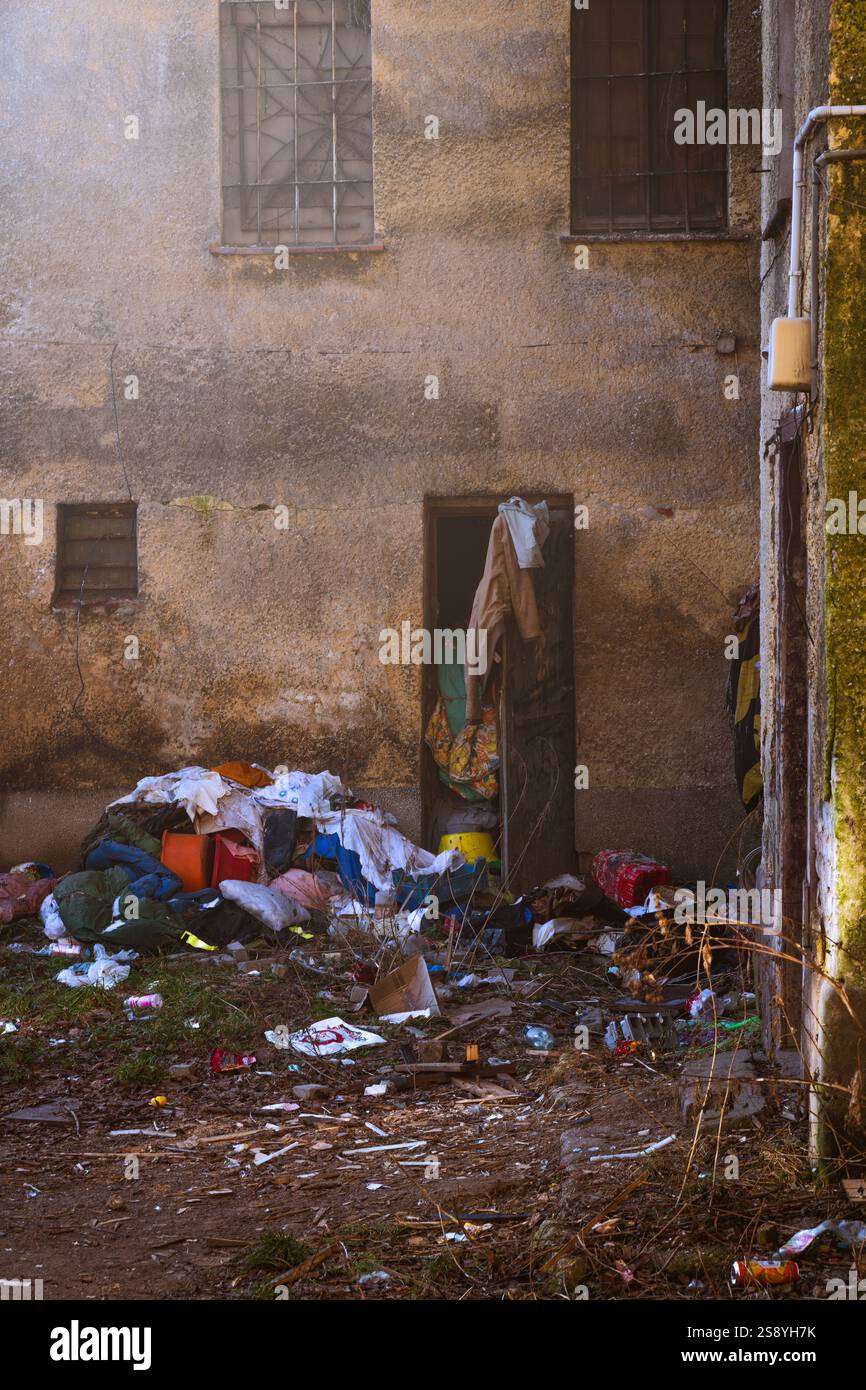 Urban decay reveals abandoned building cluttered with trash and ...