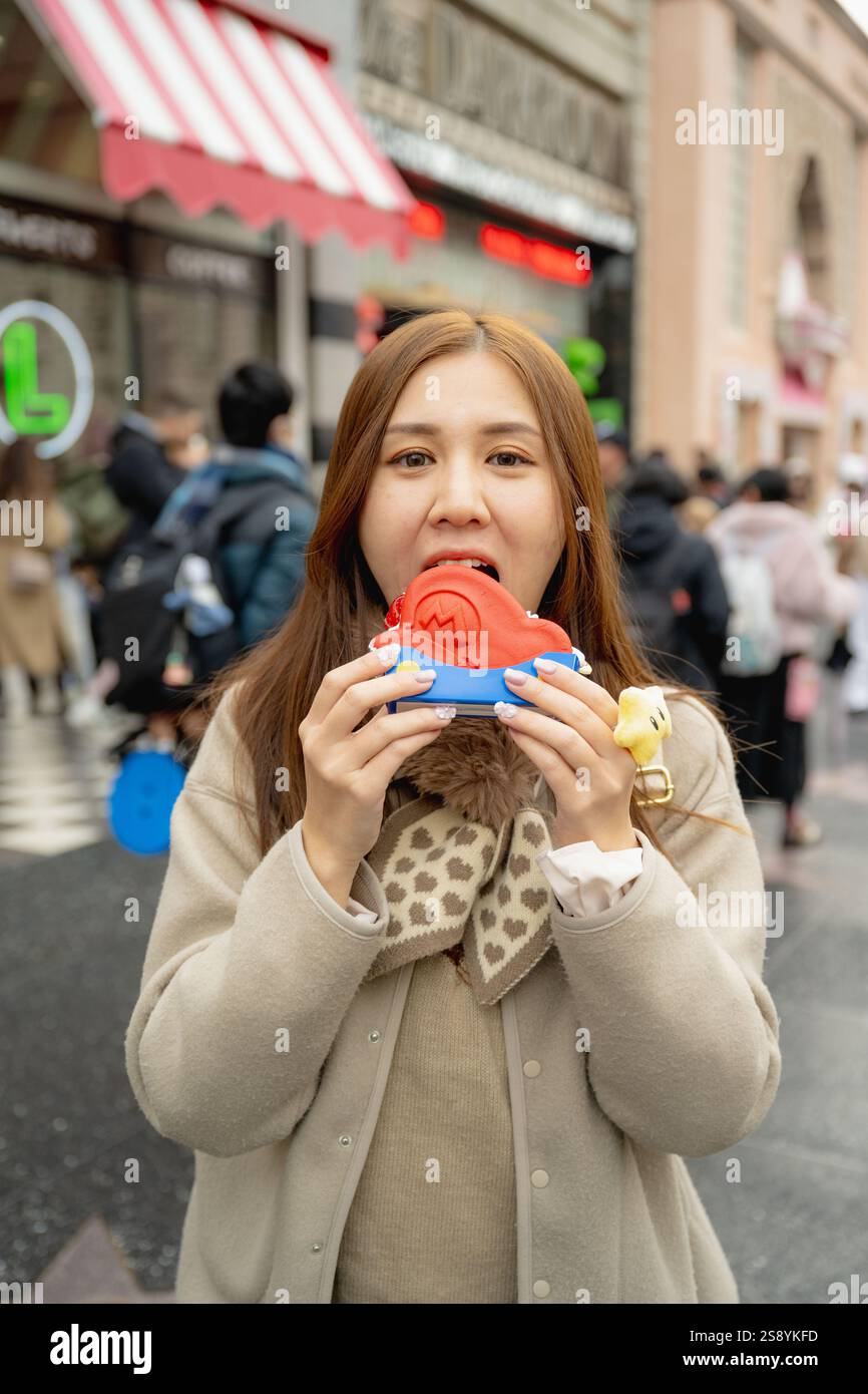 Osaka, Japan - January 9, 2024: woman eating delicious food.Super ...