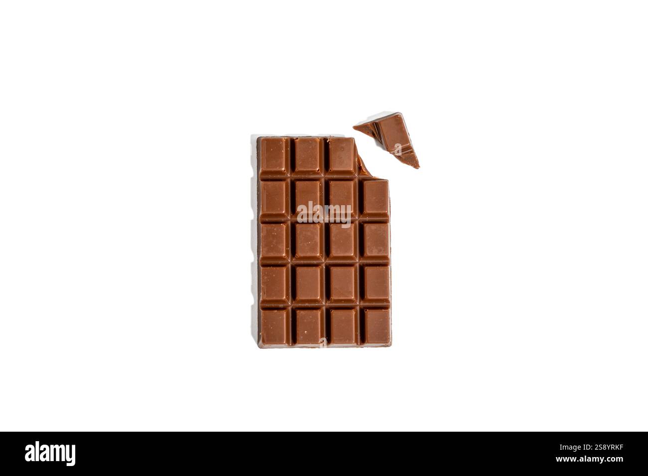 A chocolate bar with a bite taken out of it. The bite is on the right ...