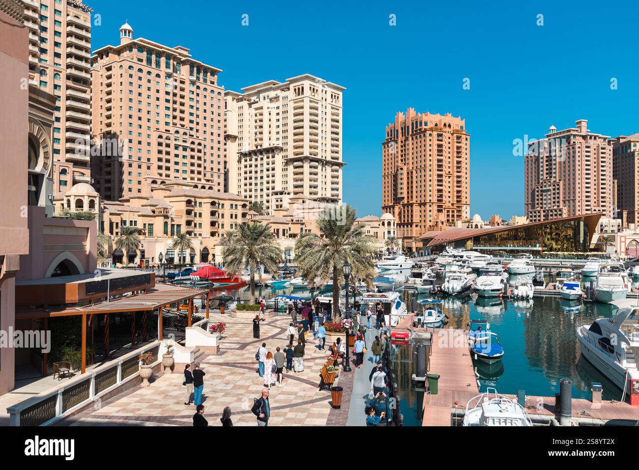 Doha, Qatar - January 4, 2025: A stunning marina with luxury yachts and ...