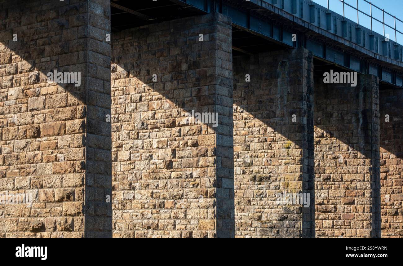 Detailed view of the stone pillars supports of Hayle railway bridge in ...