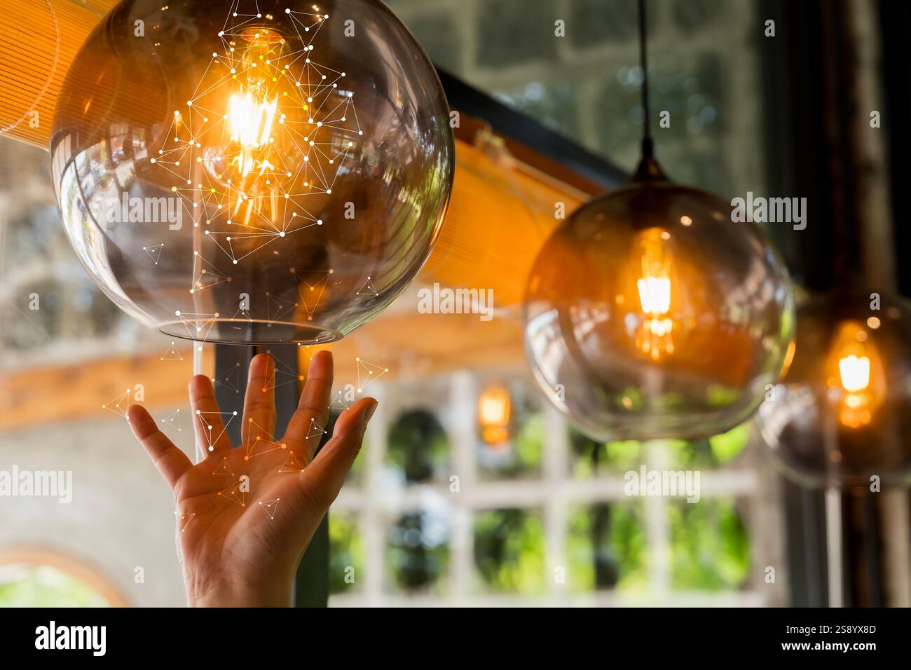 A hand reaching for conceptual idea lightbulbs. Business man holding ...