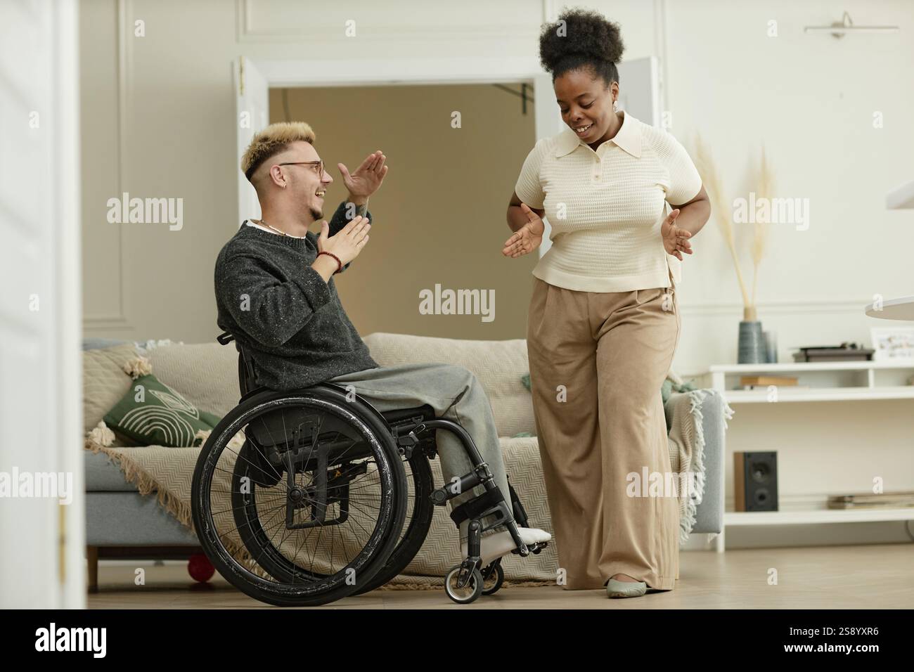 Girl in wheelchair dancing hi-res stock photography and images - Alamy