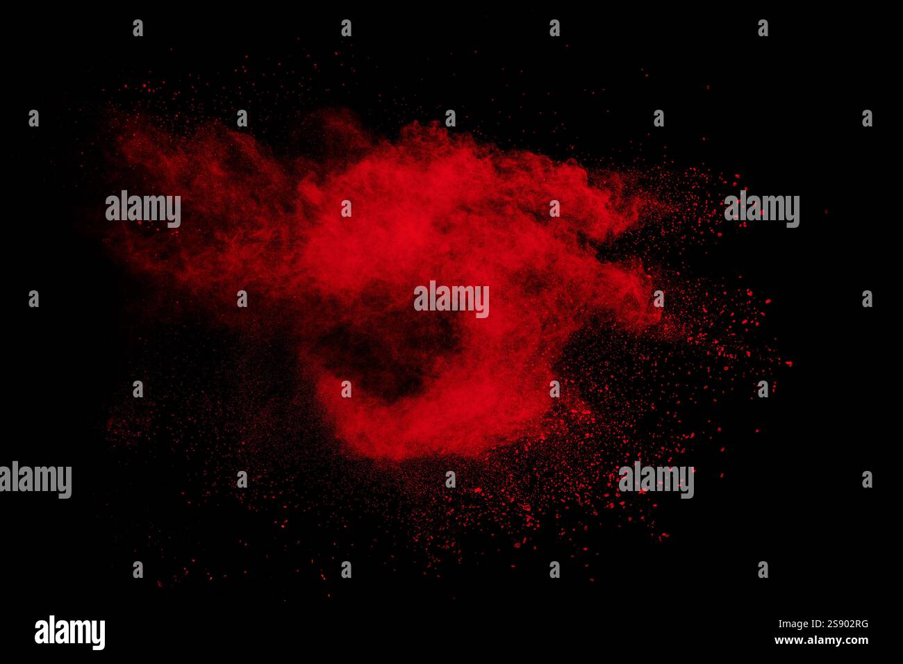 Abstract red powder dust explosion on black background Stock Photo - Alamy