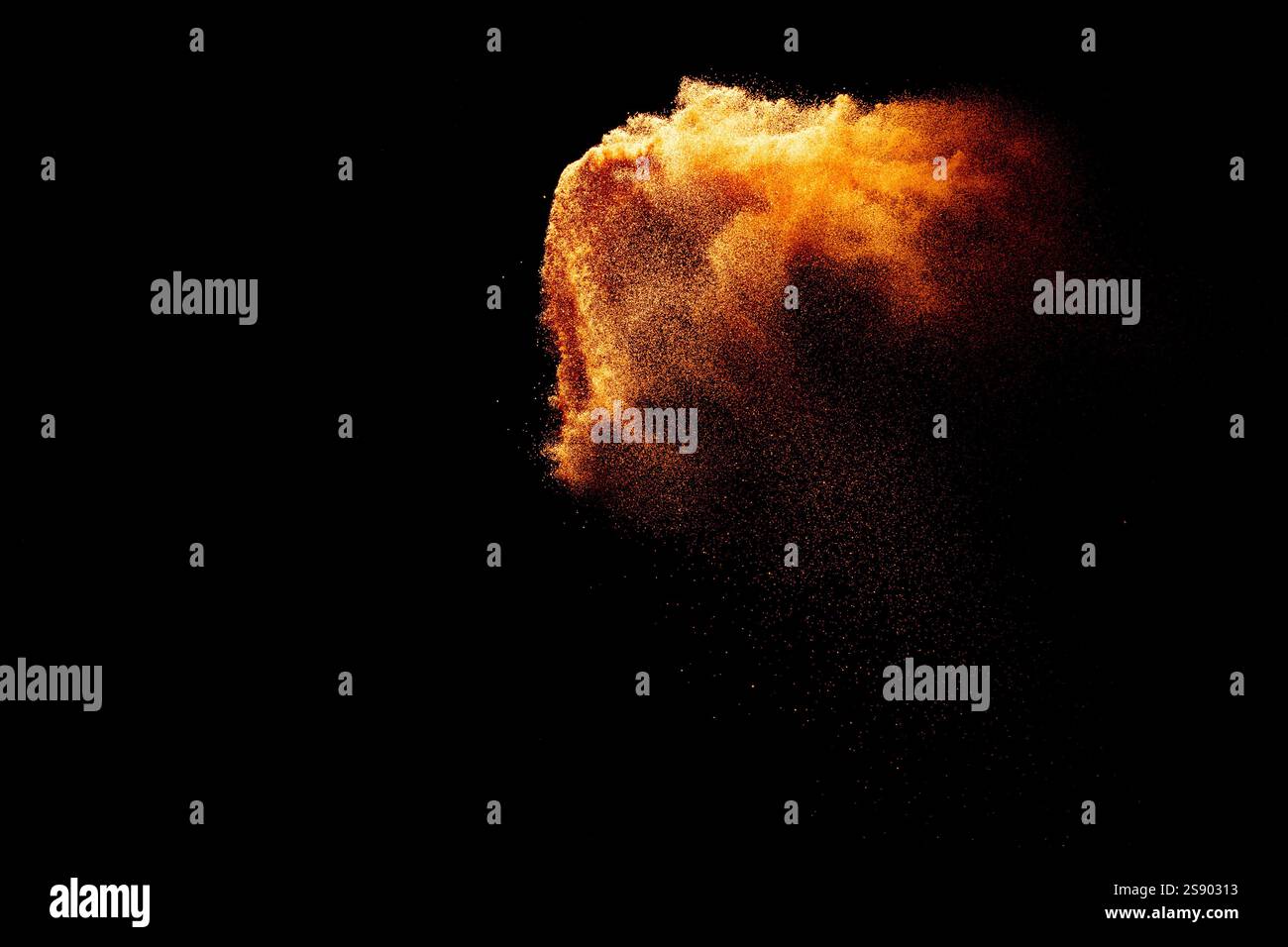 Sand flying explosion isolated on black background ,throwing freeze ...