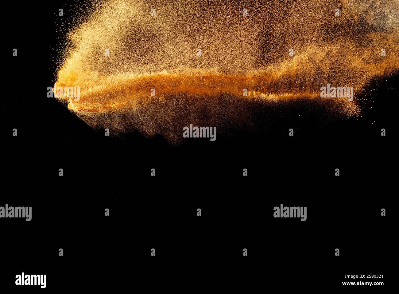 Sand flying explosion isolated on black background ,throwing freeze ...