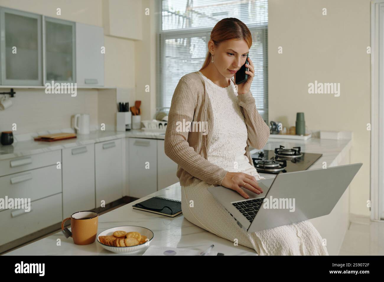 Woman engaged in task hi-res stock photography and images - Alamy