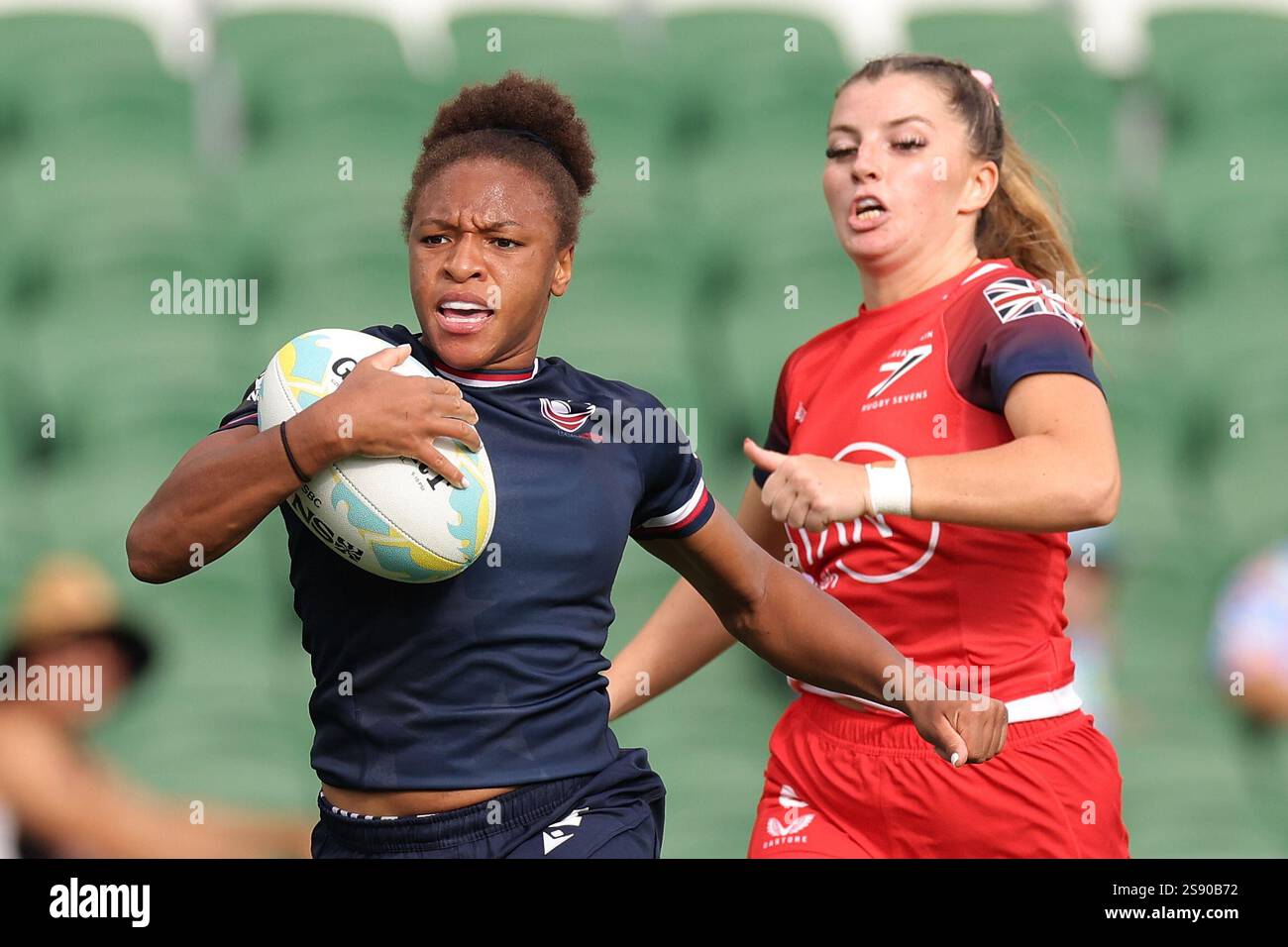 Ariana Ramsey of the USA runs in for a try under pressure Katie ...