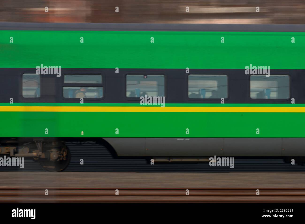 A train makes it's way as people head back home ahead of the Lunar New ...
