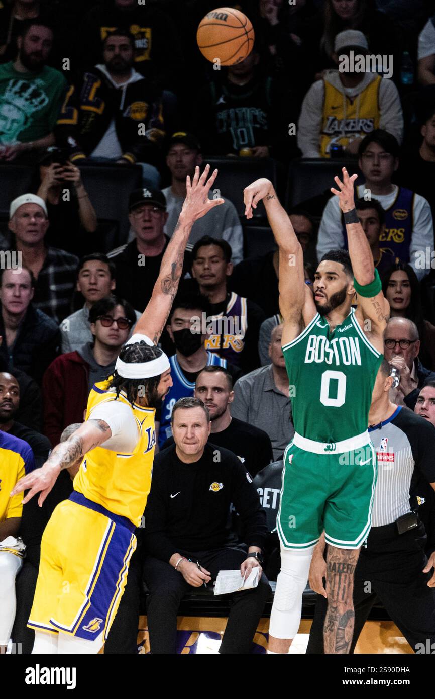 Boston Celtics' Jayson Tatum #0 shoots against Los Angeles Lakers' Anthony Davis #3 during an ...