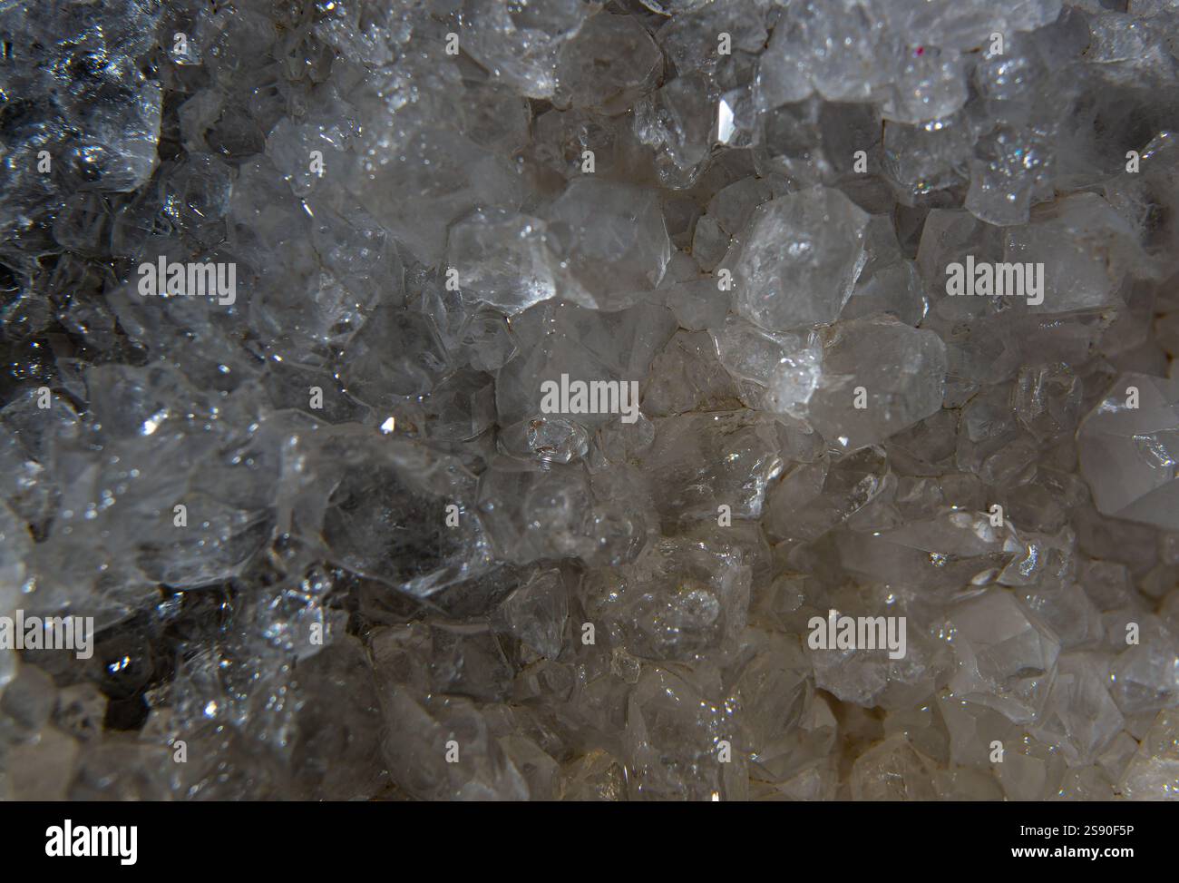 Crystal quartz displays a stunning array of sparkling facets, capturing ...