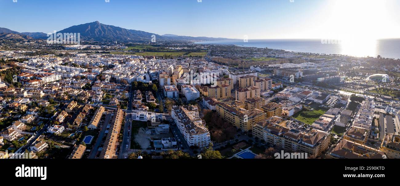 Aerial of San Pedro Alcantara neighbourhood of Marbella at sunset with ...