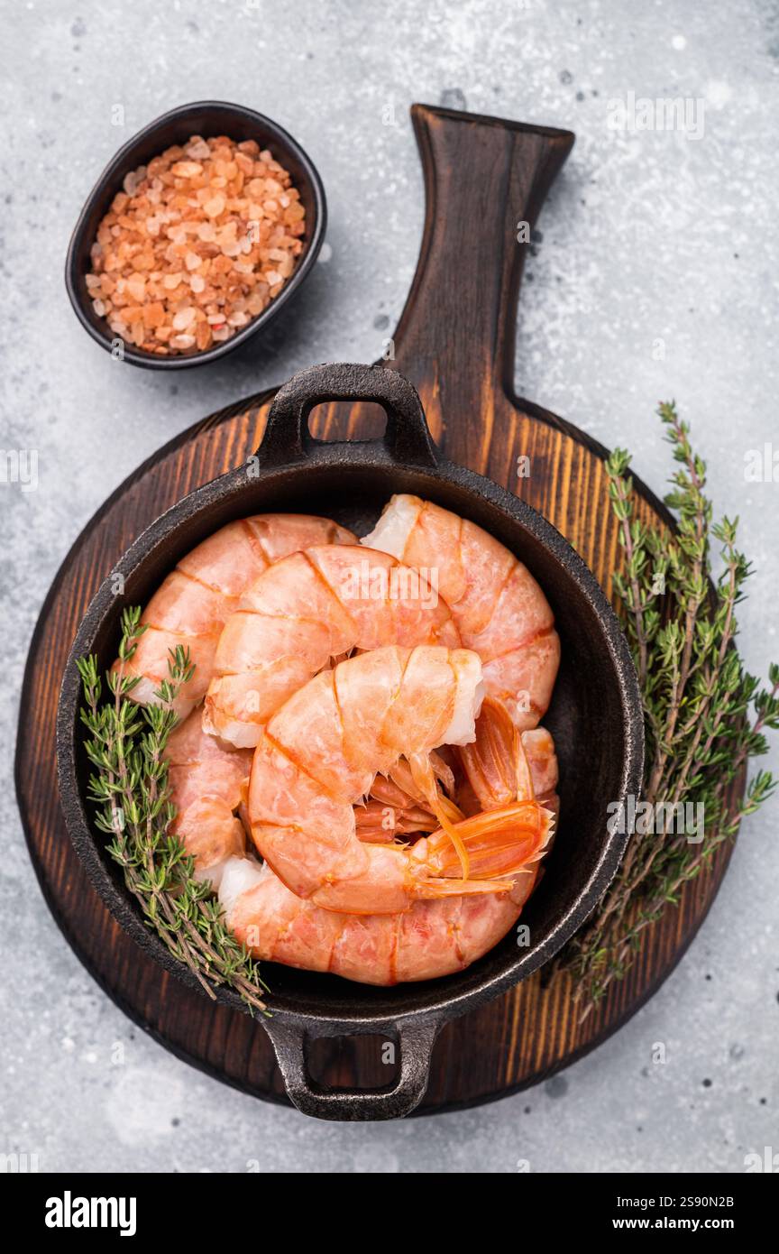 Raw Headless Red Argentine shrimps, Prawns in a skillet. grey ...