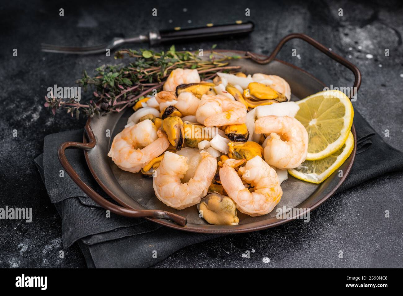 Fresh Seafood Mix with Mussels, Clams, Prawns, Shrimps and squid. black ...
