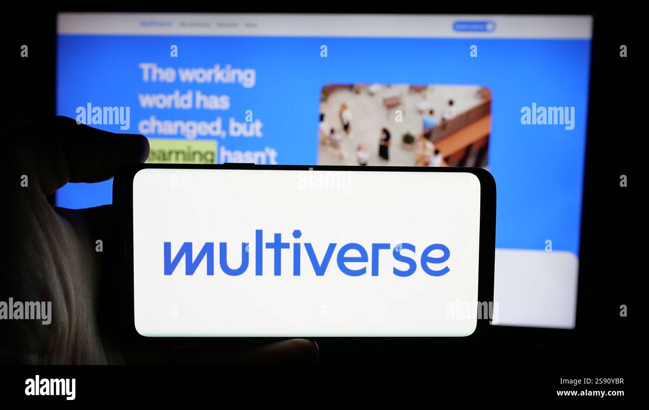 October 23, 2024, Germany: In this photo illustration, a person is holding a cellphone with the ...