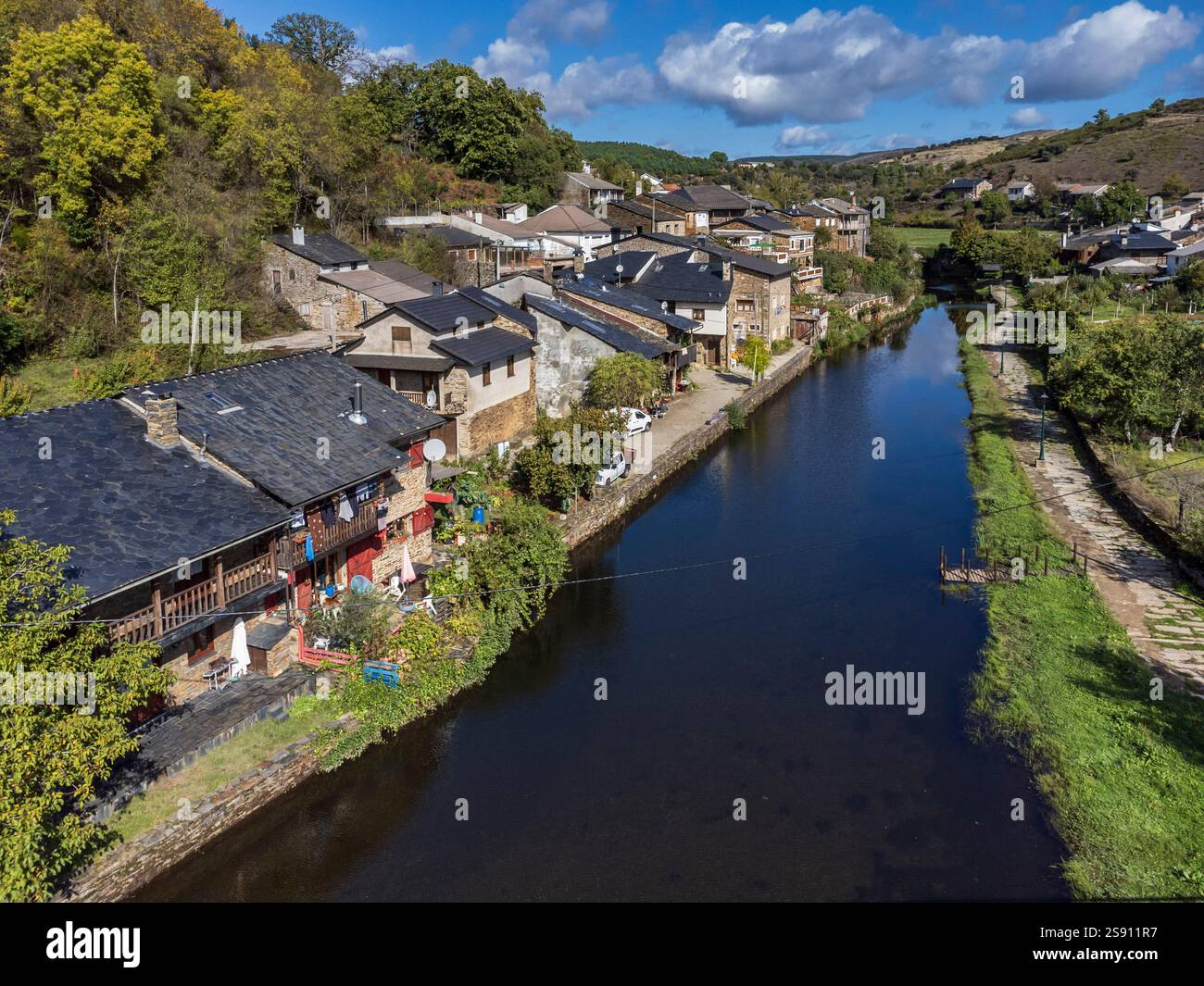 Typical houses along the Onor River, Rio de Onor town, municipality of ...