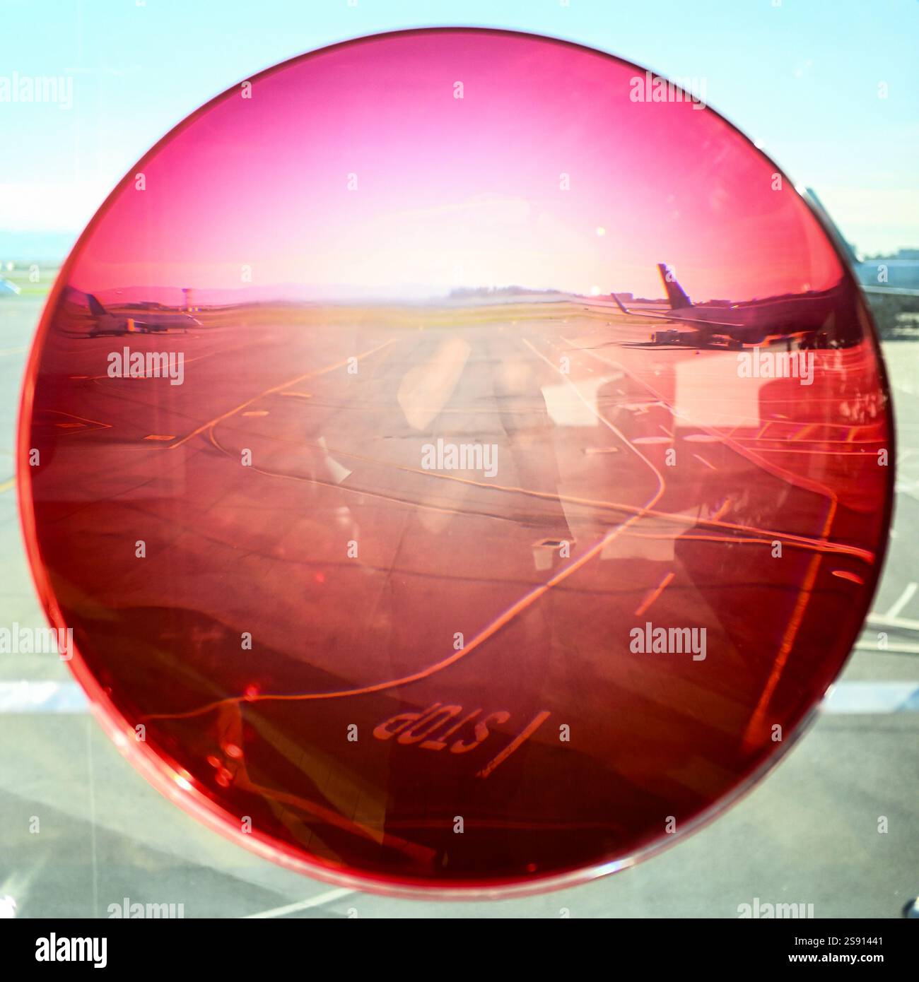 Public art installation in airport skews view of tarmac Stock Photo - Alamy
