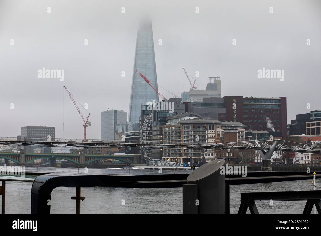 A misty grey morning on the River Thames, London , UK with the cloud ...
