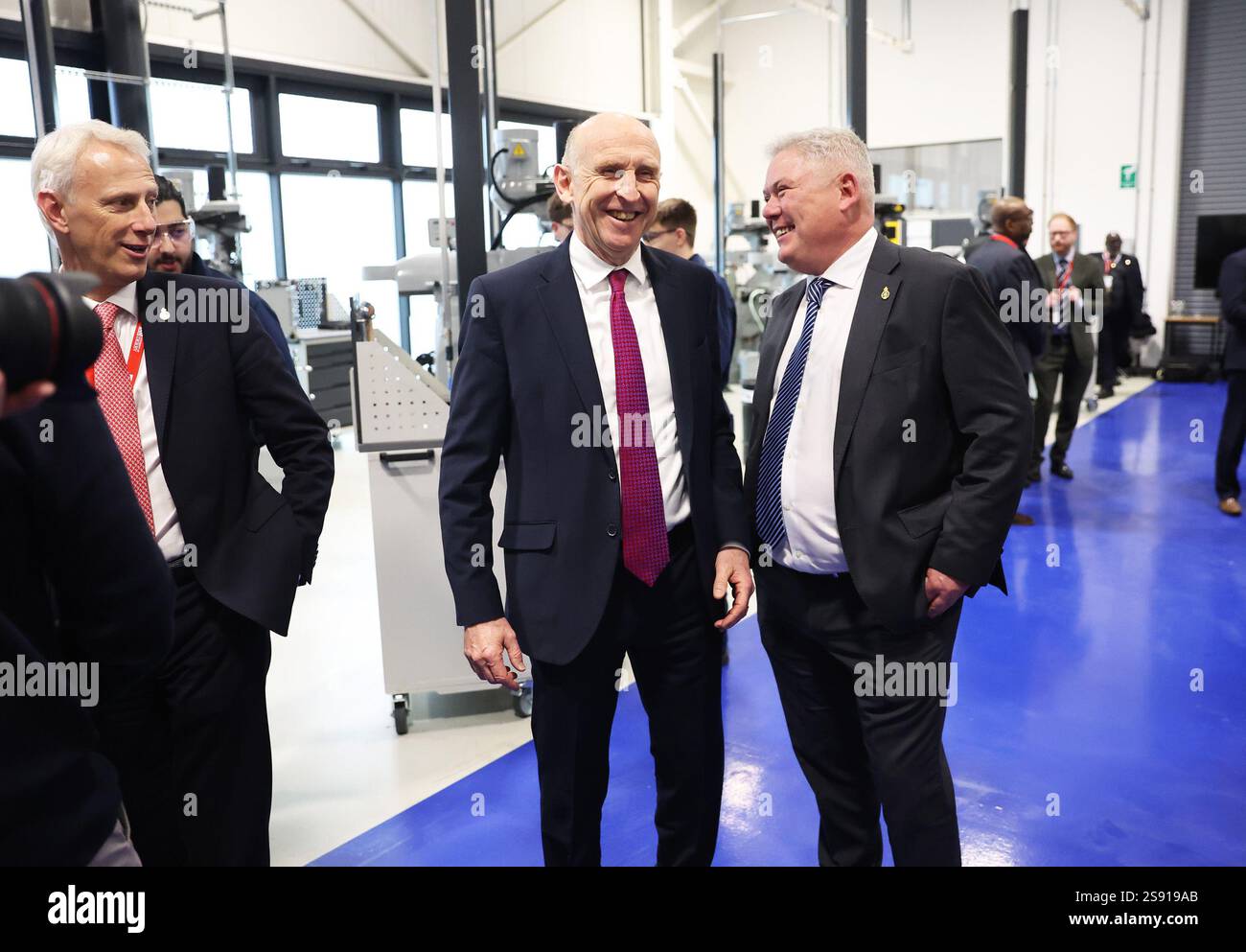 Defence Secretary John Healey speaks to Steve Carlier (right ...