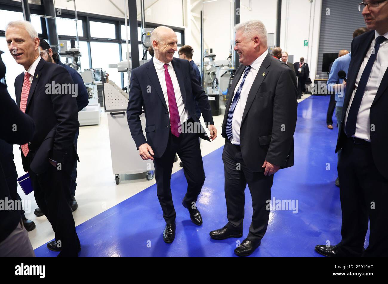 Defence Secretary John Healey speaks to Steve Carlier (right ...