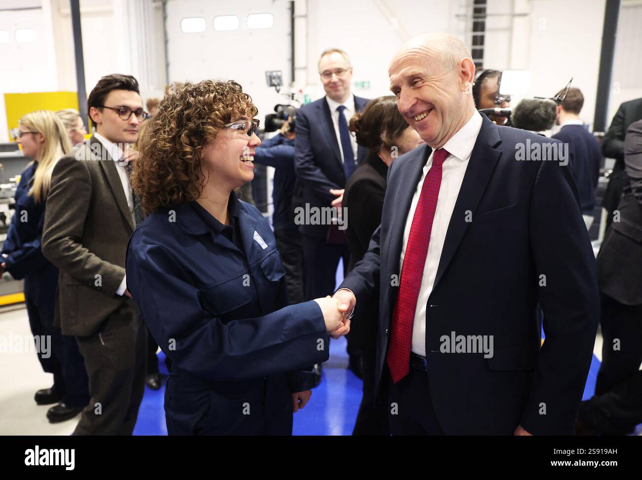 Defence Secretary John Healey speaks to an apprentice during his visit ...