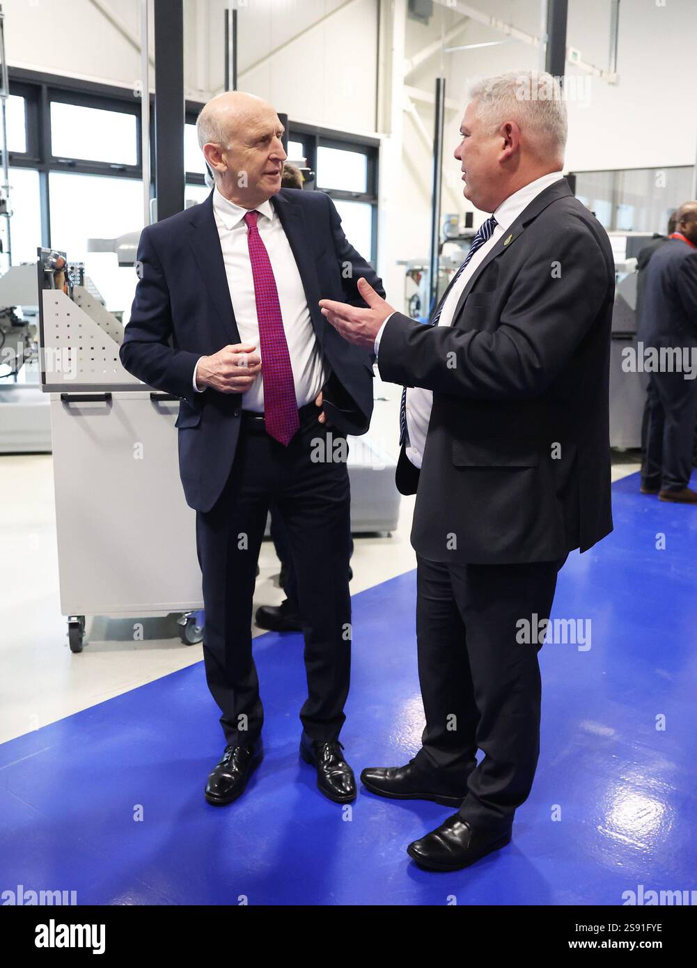 Defence Secretary John Healey speaks to Steve Carlier (right ...
