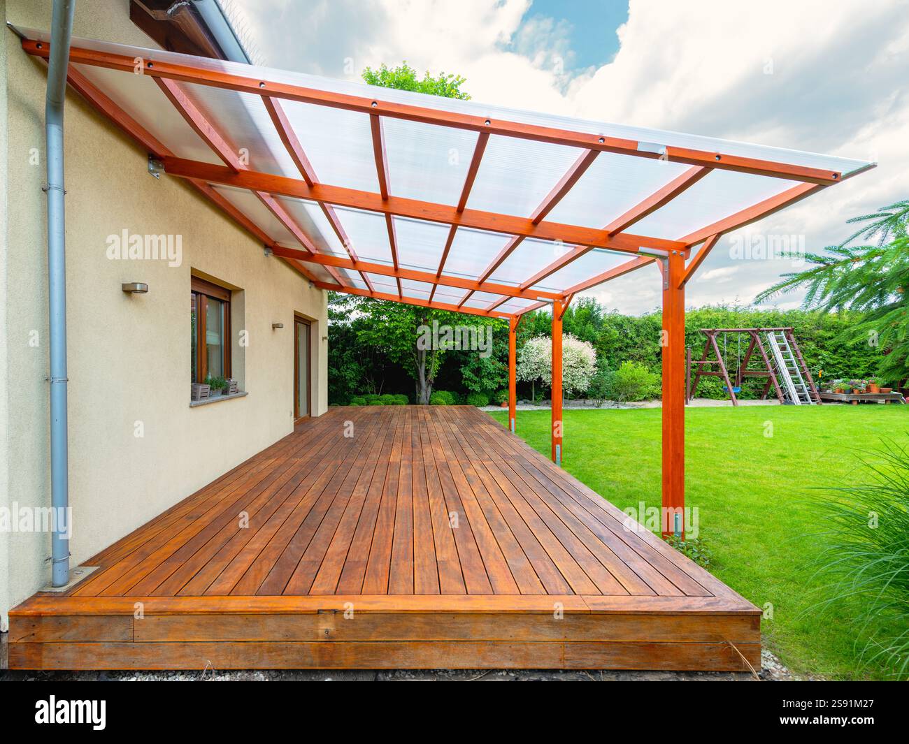 The condition AFTER renovation of the wooden terrace, showing the ...