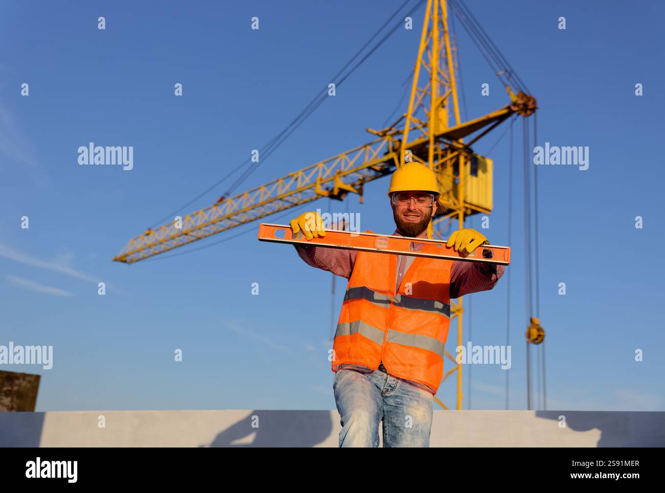 Female engineer pointing with finger while discussing building project ...