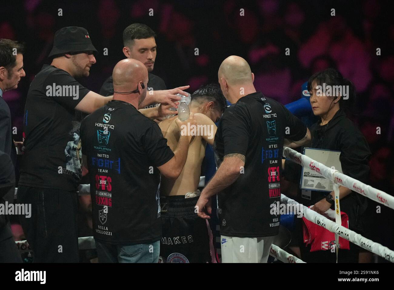 South Korea's Ye Joon Kim cools down after his match against Japanese champion Naoya Inoue for ...