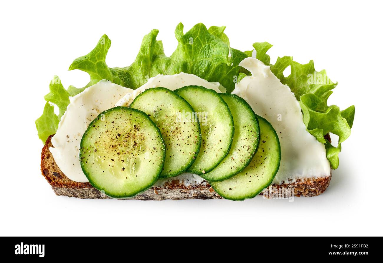 bread slice with cream cheese and cucumber isolated on white background ...