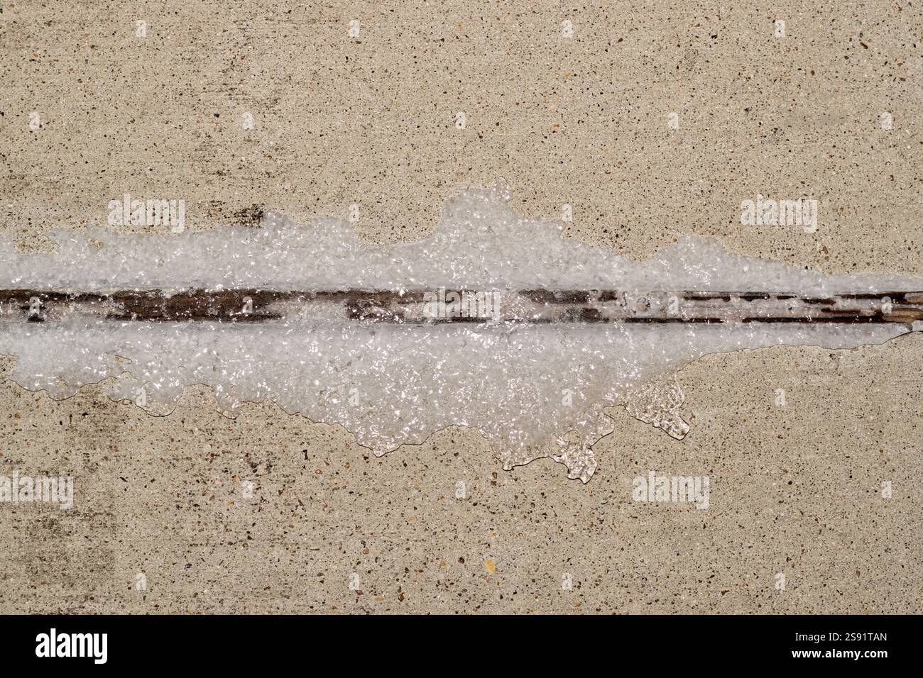 Slippery ice on sidewalk dangerous winter freezing weather conditions ...