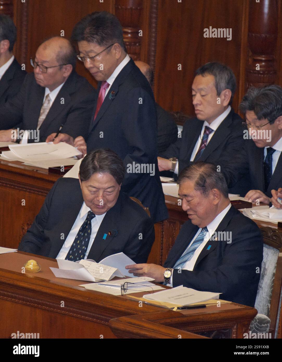 Japan's Prime Minister Shigeru Ishiba speaks with Chief Cabinet ...