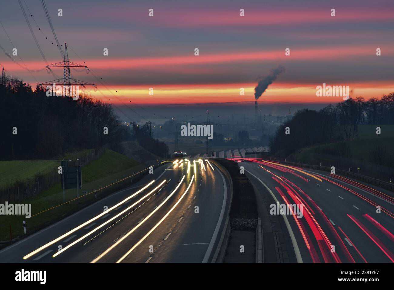 View from a bridge onto the A8 motorway near Augsburg at sunset ...