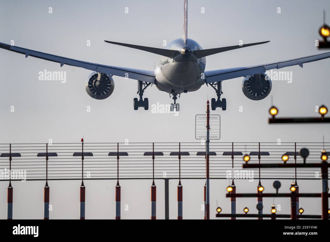 Aircraft approaching the main runway south, 05R/23L, runway lighting ...