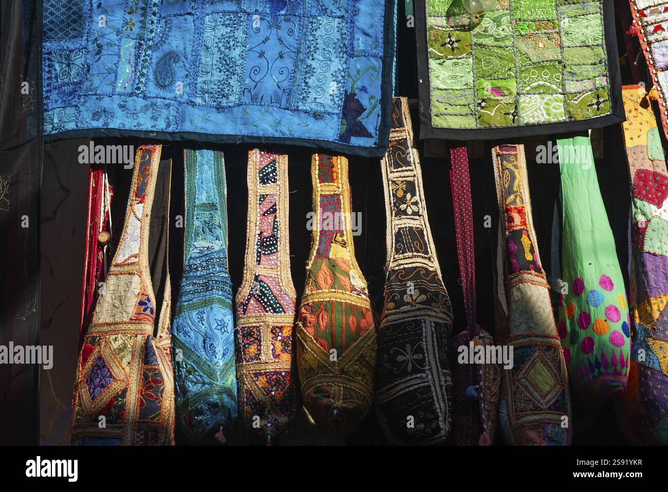Street stall with handmade bags and tapestries, old town of Pushkar at ...