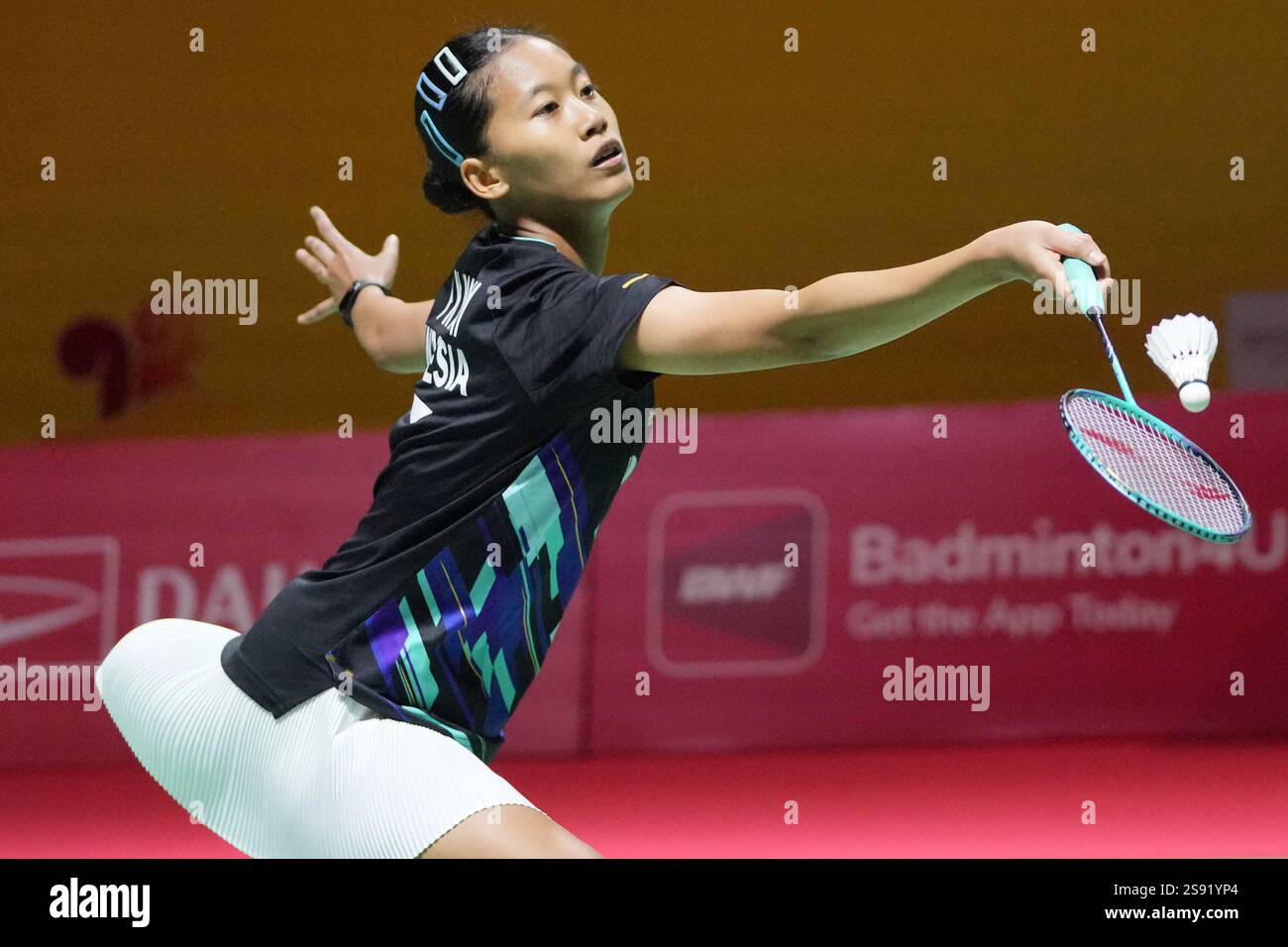Indonesia's Putri Kusuma Wardani plays a return agains Taiwan's Hsu Wen ...
