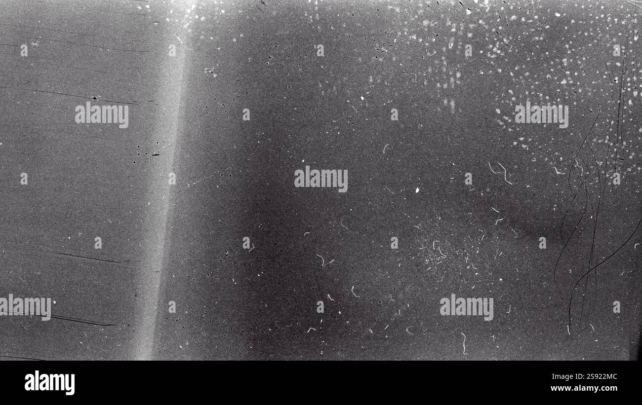 Blank grained film strip texture background with heavy grain, dust and ...