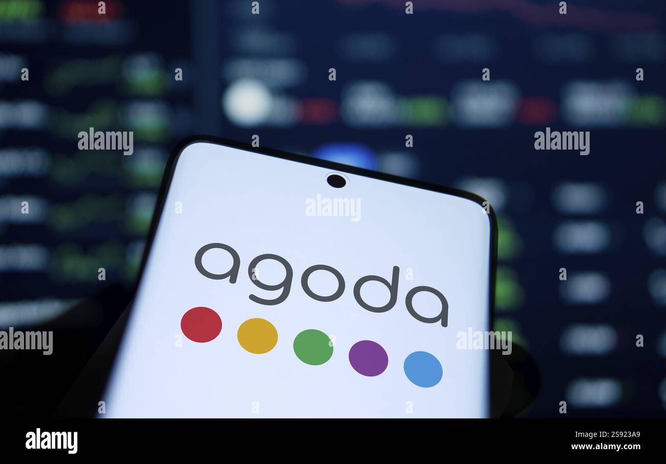 Dhaka, Bangladesh- 21 jan 2025: Agoda logo is displayed on smartphone. Agoda is an online travel ...