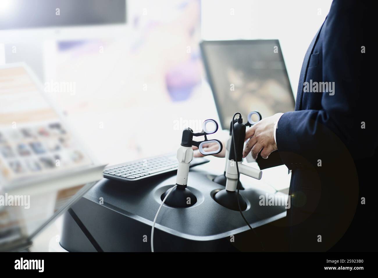 Person interacting with a laparoscopic surgical simulator in a modern ...