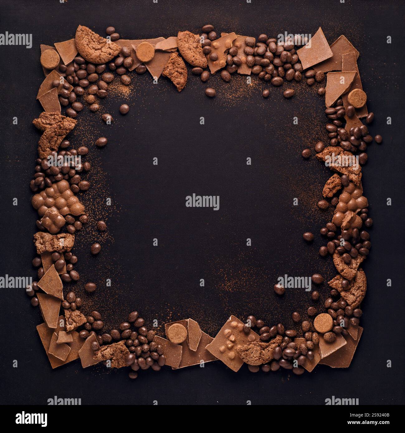 Creative concept photo of chocolate frame on black background Stock ...