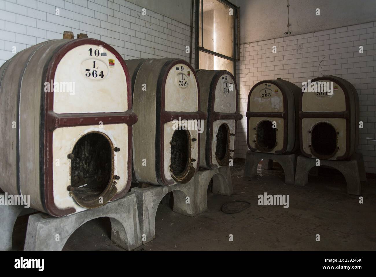 A picture of some abandoned barrels in a scary place Stock Photo - Alamy