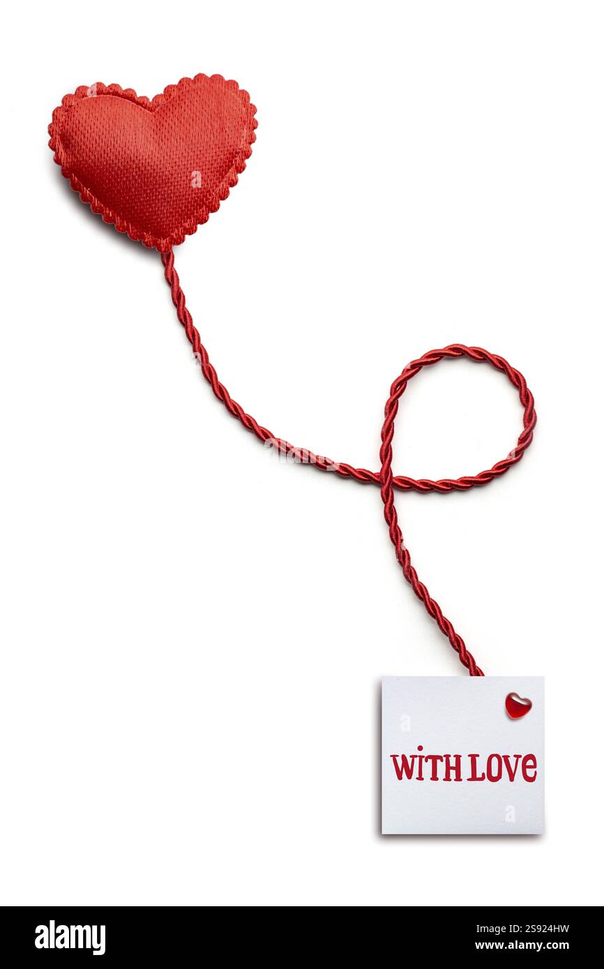 Creative valentines concept photo of hearts on the rope on white ...