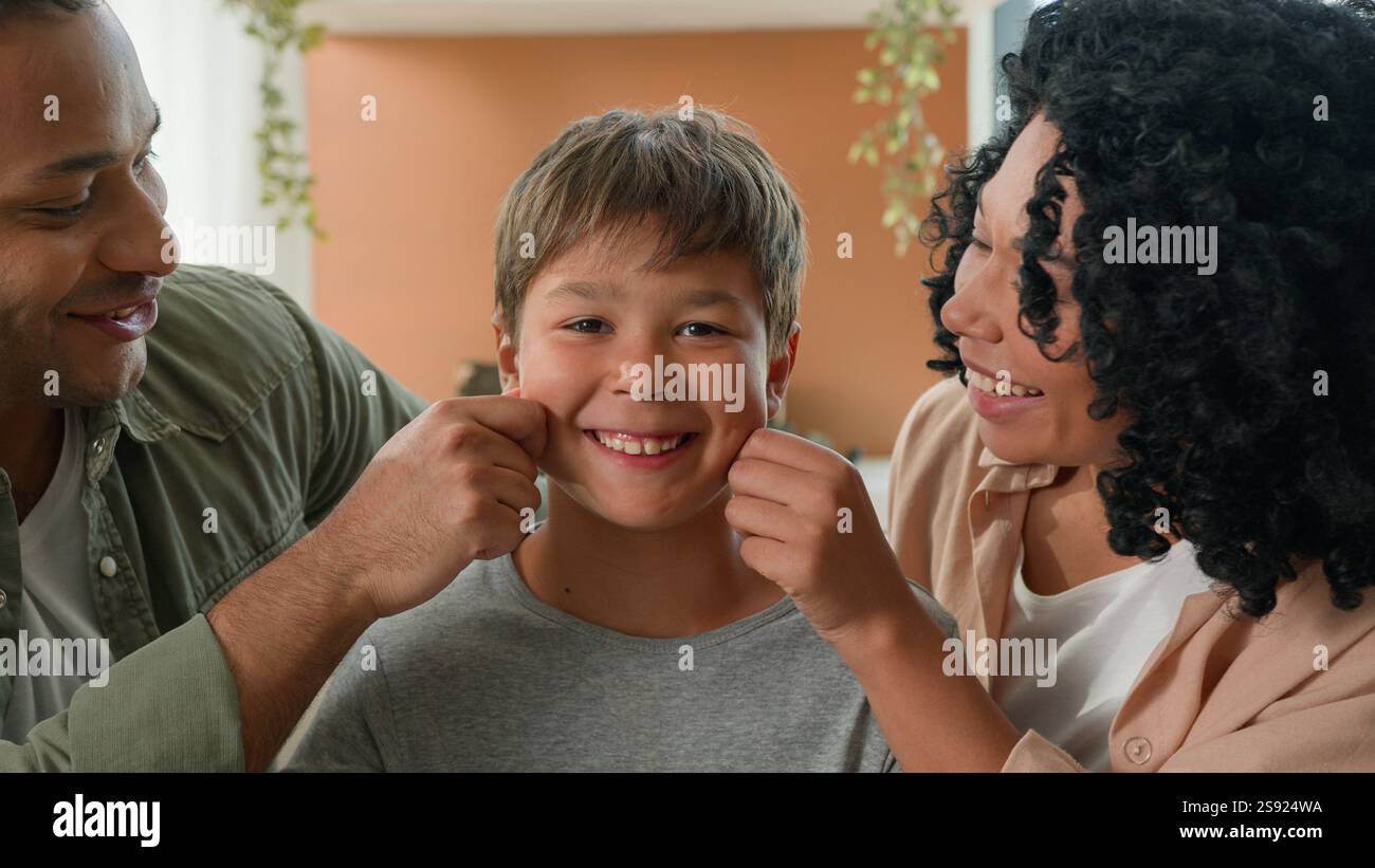 Multiracial family portrait loving African American parents father ...