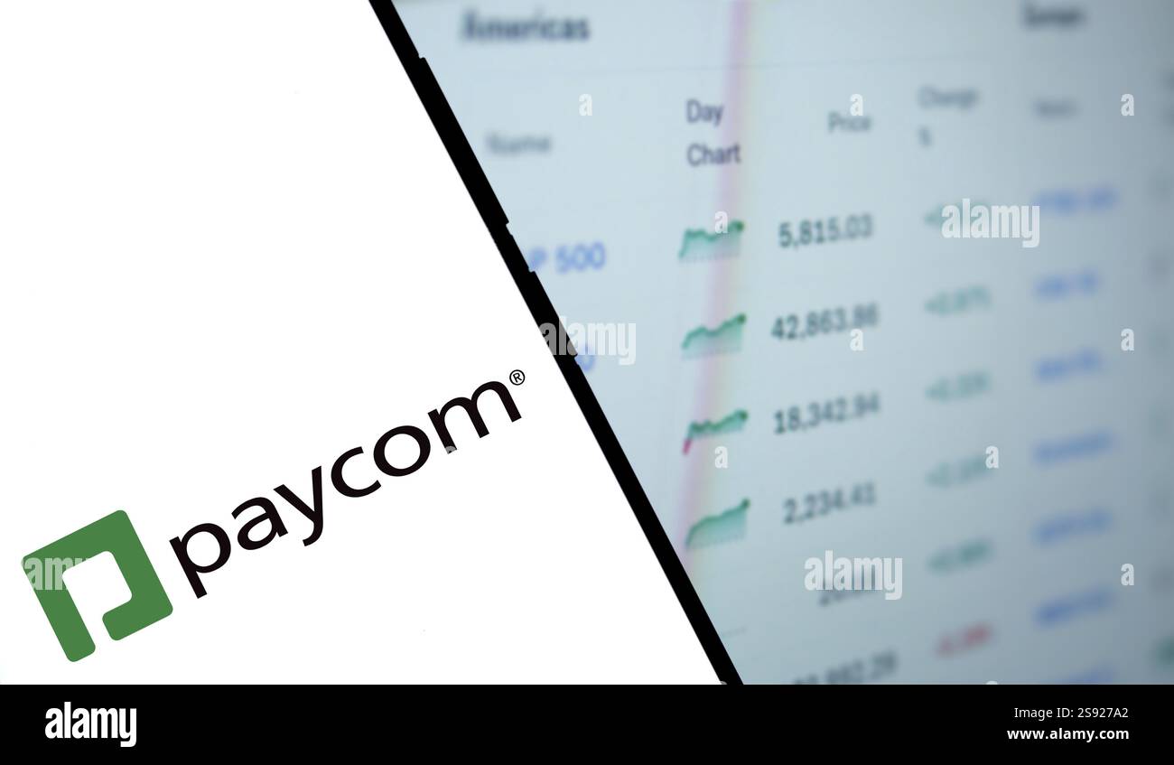 Dhaka, Bangladesh- 19 Jan 2025: paycom logo is displayed on smartphone ...