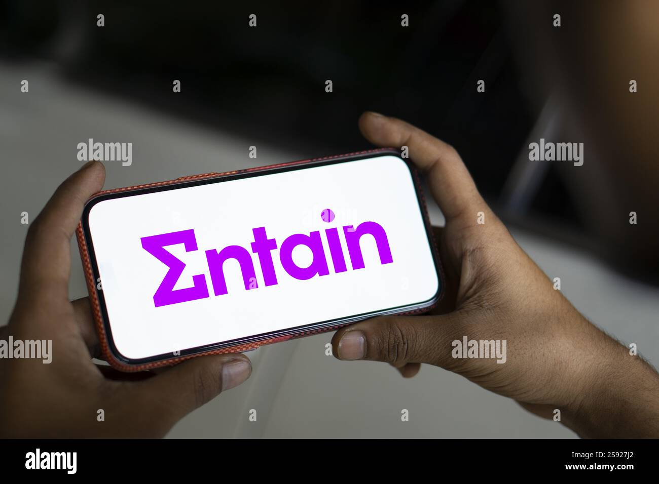 Dhaka, Bangladesh- 28 Nov 2024: Entain logo is displayed on smartphone ...